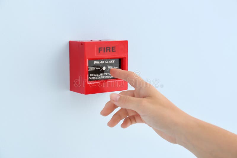 Woman Using Manual Call Point of Fire Alarm System Stock Photo - Image ...