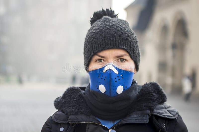Woman Using a Mask, Protecting Herself from Smog Stock Image - Image of ...