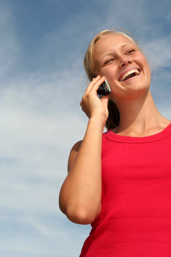 Woman using a mobile phone stock image. Image of good - 1026529