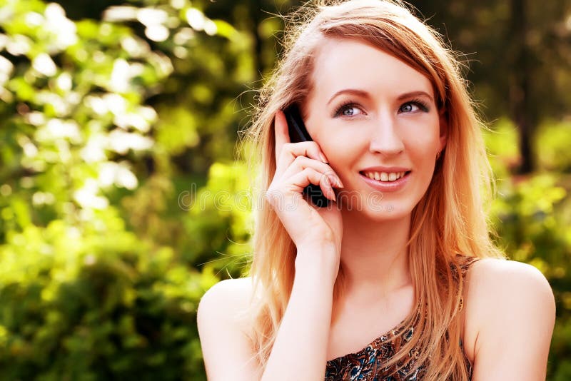 Woman using mobile phone stock image. Image of connection - 10898815