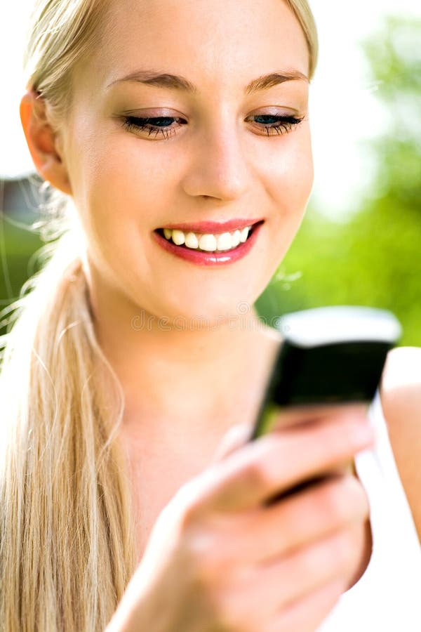 Woman Using Mobile Phone stock image. Image of telephone - 9388867