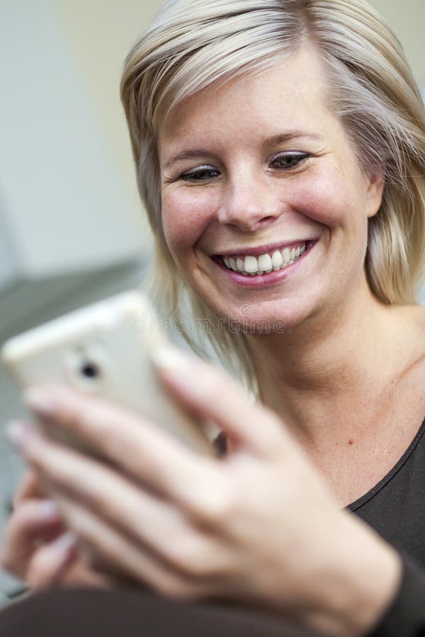 A Woman Using a Mobile Phone. Stock Photo - Image of digital, phone ...