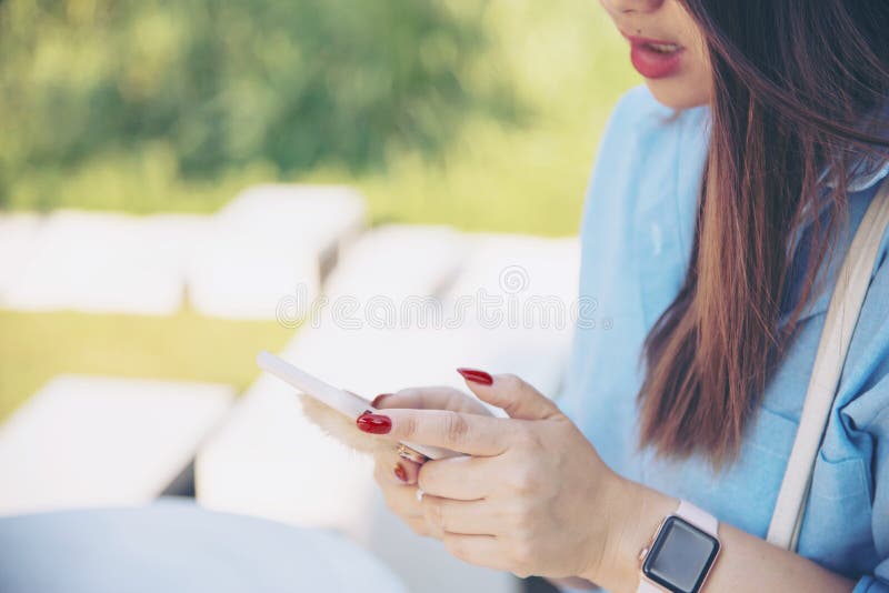 Woman using mobile phone stock photo. Image of beauty - 230319130