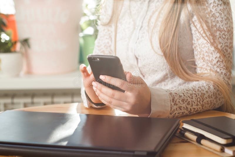 Woman Using Mobile Phone and Laptop at Home. Stock Image - Image of ...
