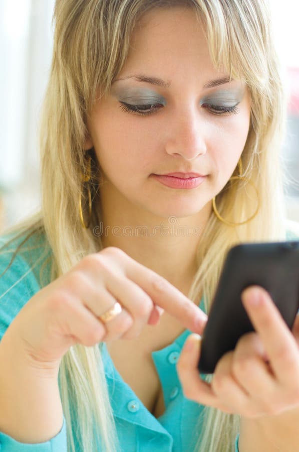 Woman using mobile phone stock photo. Image of people - 31721722