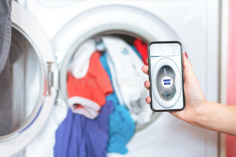 Smart wash stock photo. Image of close, remote, holding - 176756810