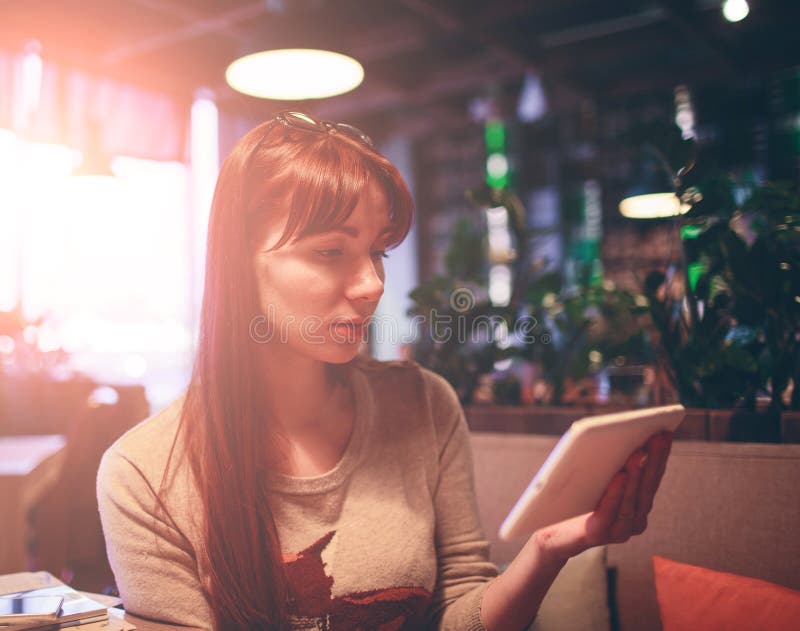 Woman Using a Mobile Phone in Restaurant, Cafe,bar Stock Image - Image ...
