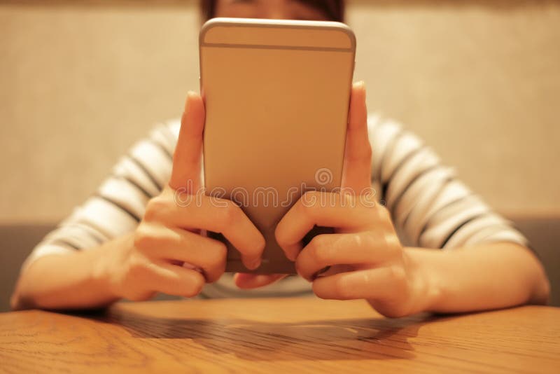 Woman Using Mobile Phone and Waiting Alone in Restaurant Background ...