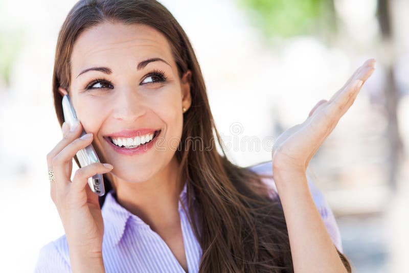 Woman using mobile phone stock image. Image of happy - 31389059