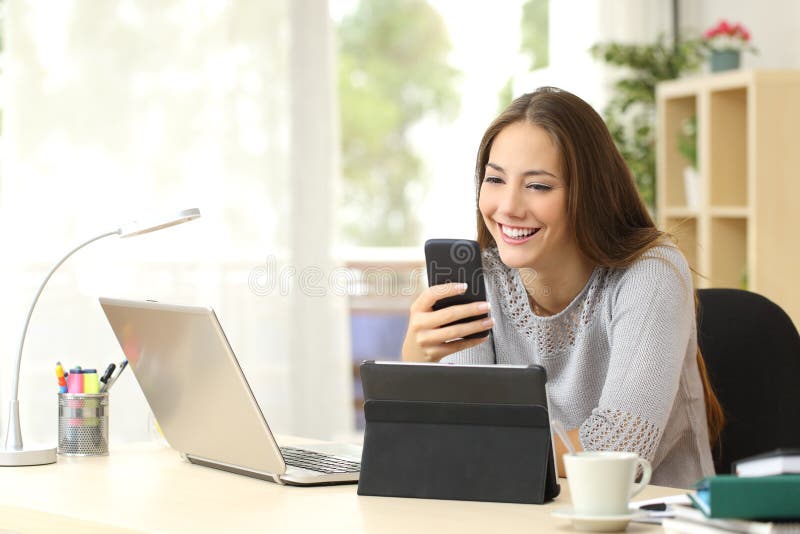 Woman Using Multiple Devices at Home Stock Image - Image of home, happy ...