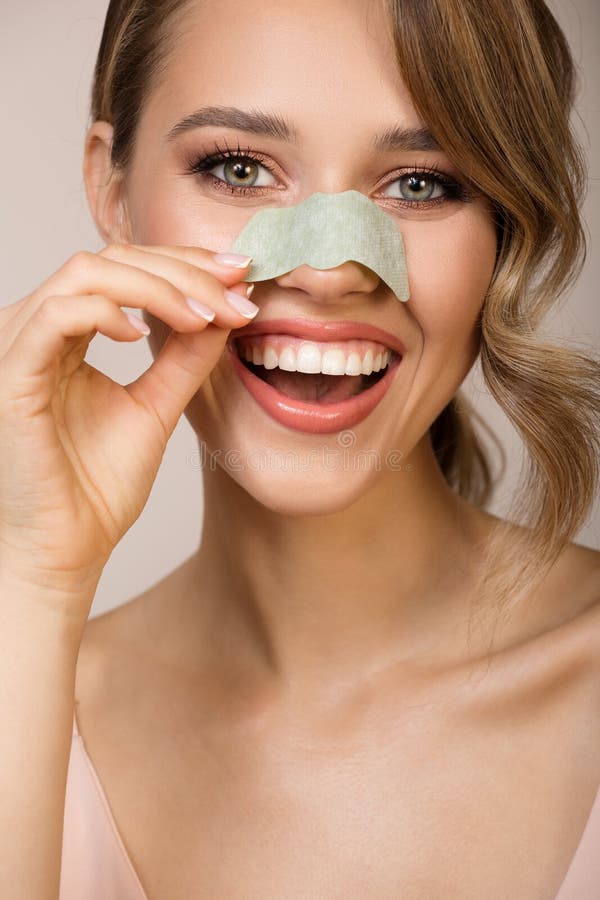 Woman Using Nose Applicator Mask Stock Photo - Image of acne, female ...