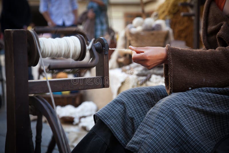 Woman Using an Old Spinning Wheel Stock Photo - Image of winding ...