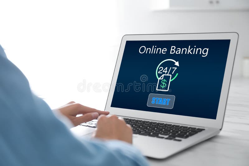 Woman Using Online Banking Application on Laptop at Table, Closeup ...