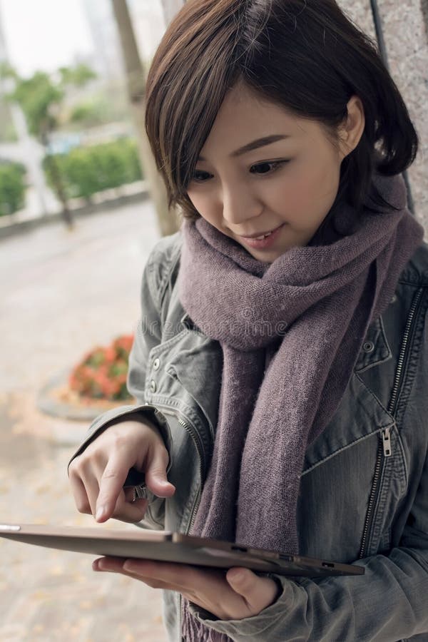 Woman using a pad stock photo. Image of attractive, digital - 37723956
