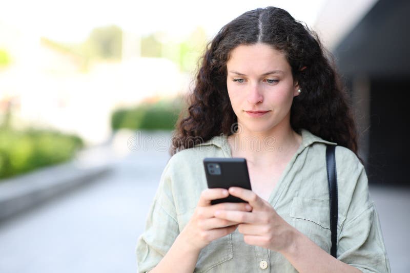 Woman Using Phone and Walking in the Street Stock Image - Image of ...