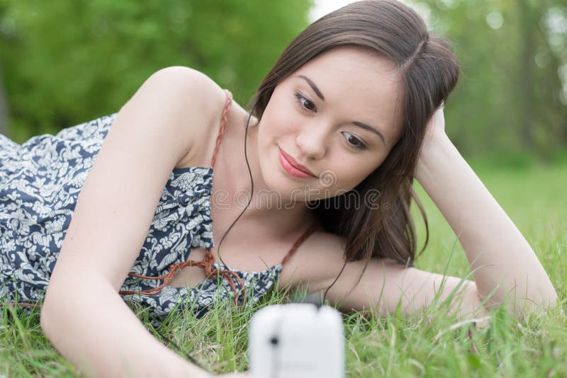 Woman using phone stock photo. Image of listening, outdoor - 53937992