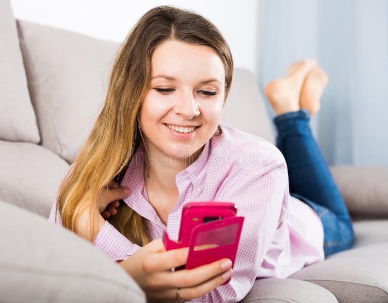 Woman using phone stock image. Image of leisure, female - 199000485