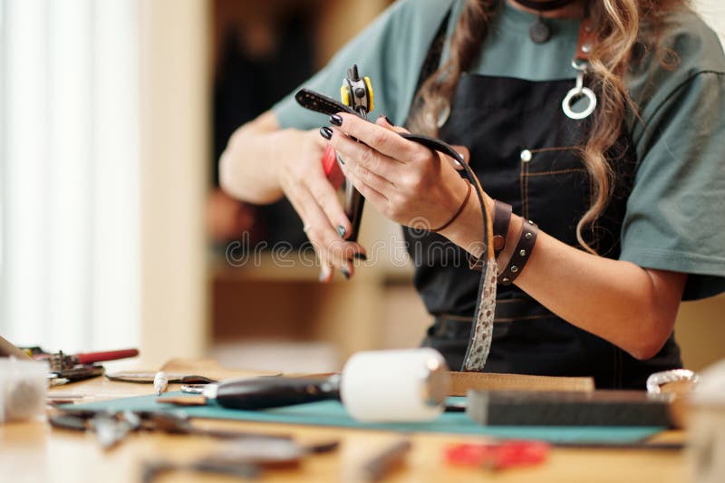 Woman Using Rotary Punch Tool Stock Photo - Image of wrench, order ...