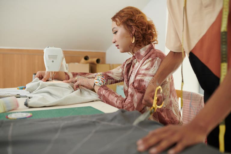 Woman Using Sewing Machine stock photo. Image of lifestyle - 291407690
