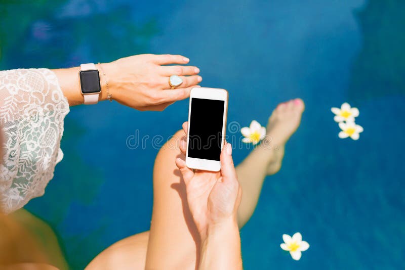 Woman Using Smart Digital Tech by the Pool Stock Image - Image of ...