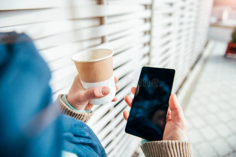 Woman Using Smart Phone and Holding Coffee Stock Image - Image of ...