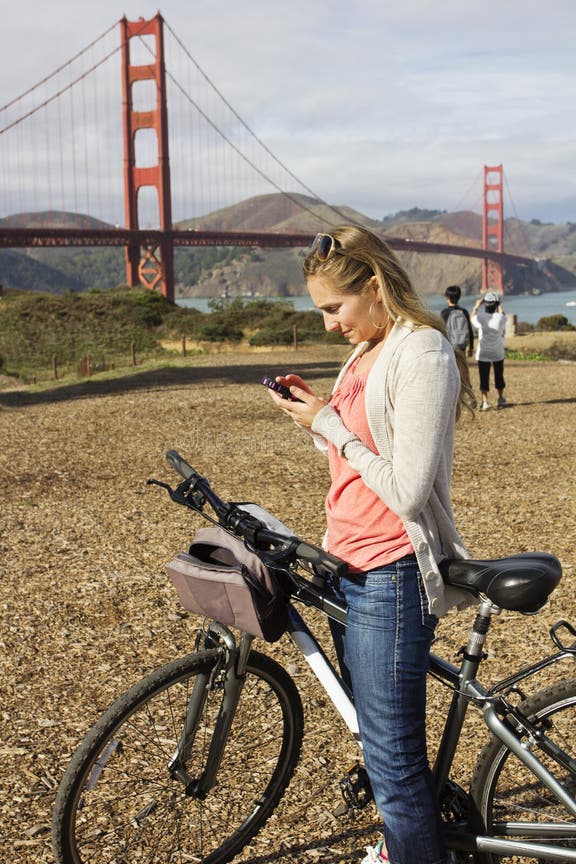 Woman Using a Smart Phone on Vacation Stock Image - Image of cell ...