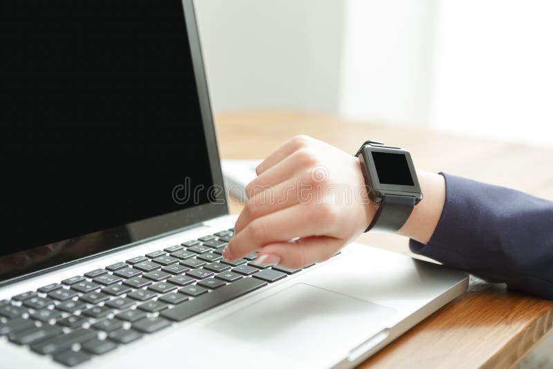 Woman Using Smart Watch at Workplace, Close Up, Side View, Stock Image ...