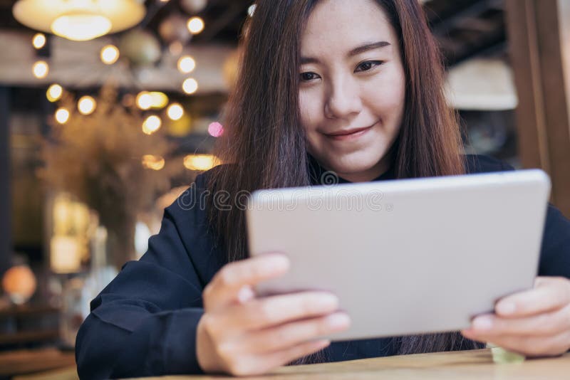 Woman using tablet stock image. Image of digital, computer - 92524261