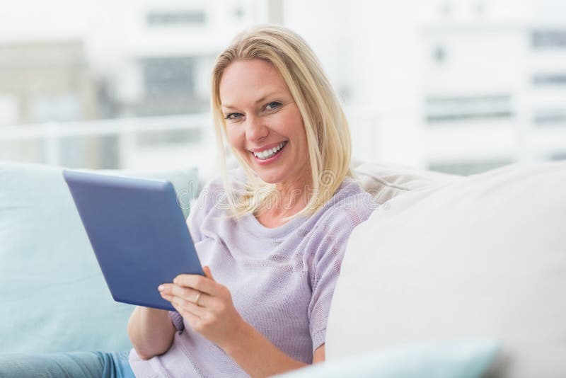Woman on Couch with IPad Tablet Wireless Computer Editorial Stock Image ...