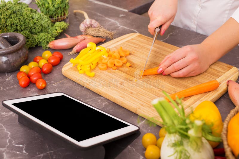 Woman Using Tablet for Cooking Stock Image - Image of person, green ...