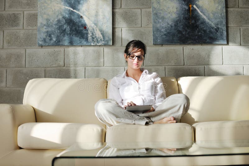 Woman Using Tablet Pc at Home Stock Photo - Image of happy, relaxation ...