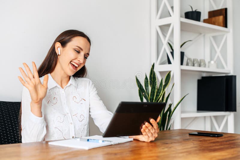 Woman Using a Tablet for Video Call Stock Image - Image of office ...