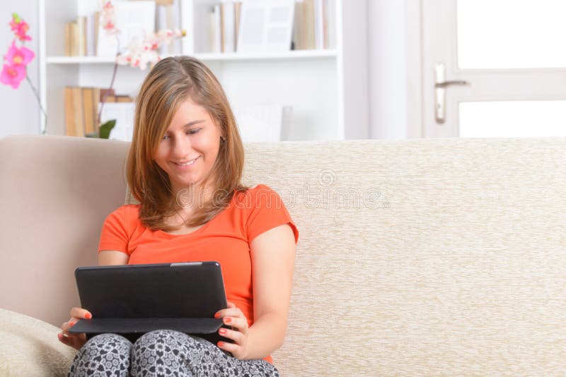 Woman on Couch with IPad Tablet Wireless Computer Editorial Stock Image ...
