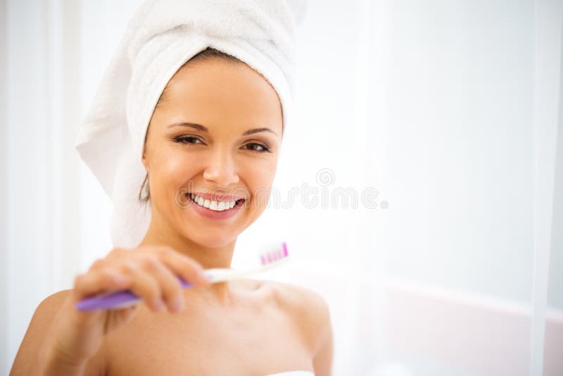 Woman using toothbrush stock photo. Image of teeth, closeup - 39554006