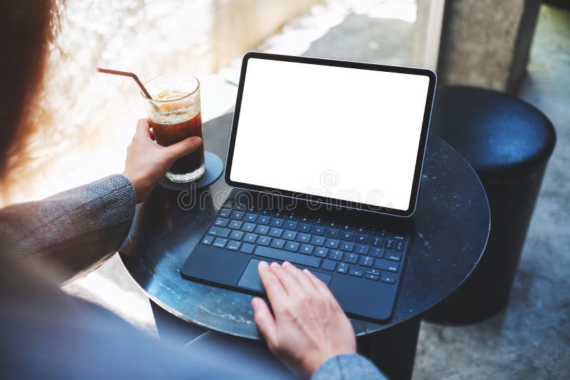 A Woman Using and Touching on Tablet Touchpad with Blank White Desktop ...