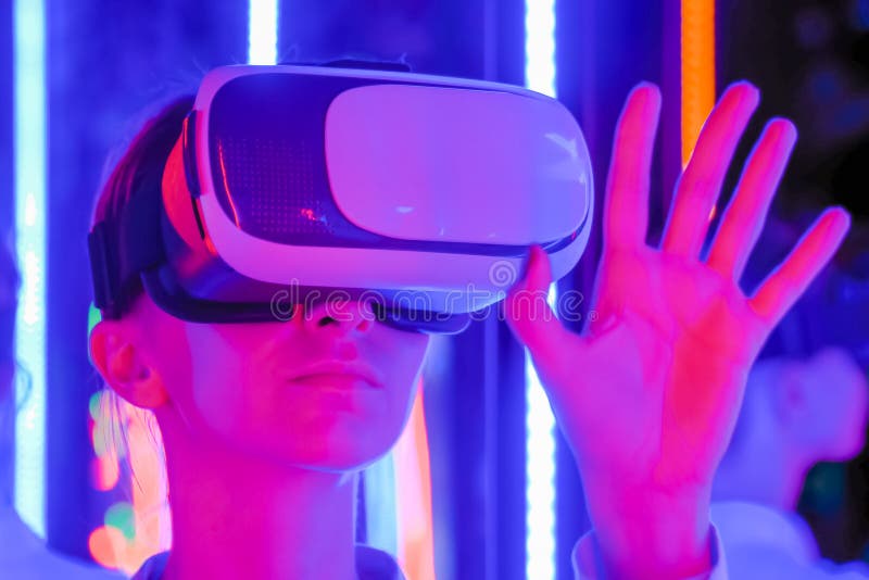 Woman Using Virtual Reality Headset at Interactive VR Exhibition: Close ...