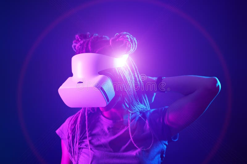 Woman is Using Virtual Reality Headset. Neon Light Studio Portrait ...