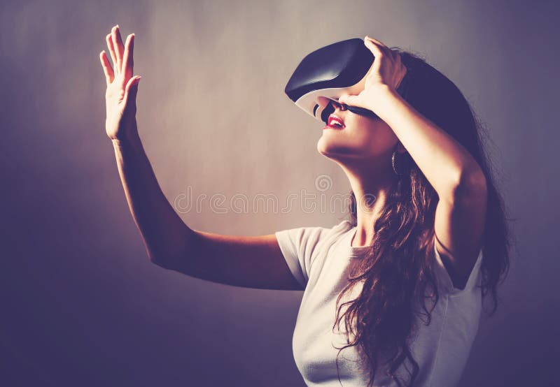 Attractive Woman Wearing Virtual Reality Goggles. VR Headset Stock ...