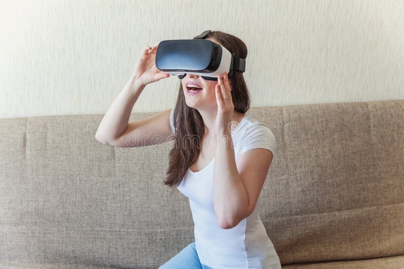 Woman using VR headset stock image. Image of happy, contemporary - 91404385