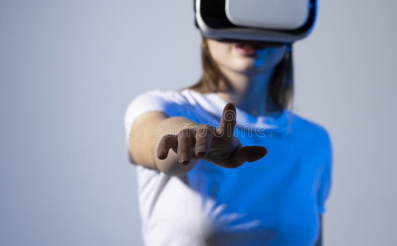 Woman Using VR Virtual Reality Glasses Headset Pointing at Objects in ...