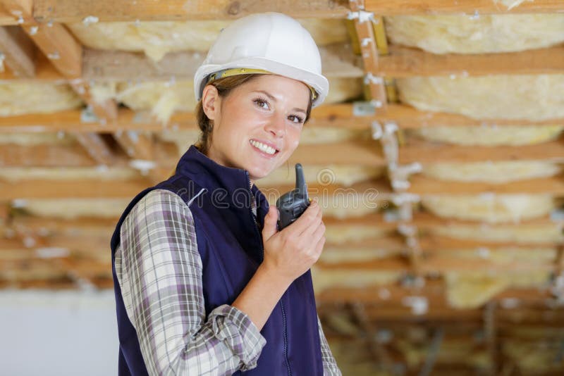 Woman Using Walkie Talkie on Work Site Stock Photo - Image of people ...
