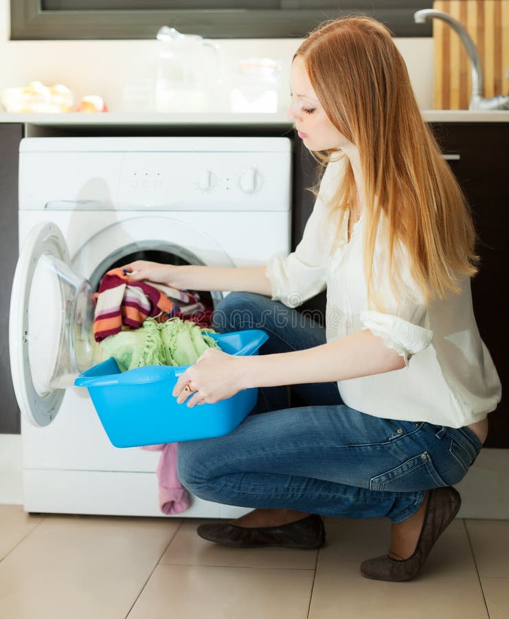 Long Haired Woman Using Washing Machine Stock Photos - Free & Royalty ...