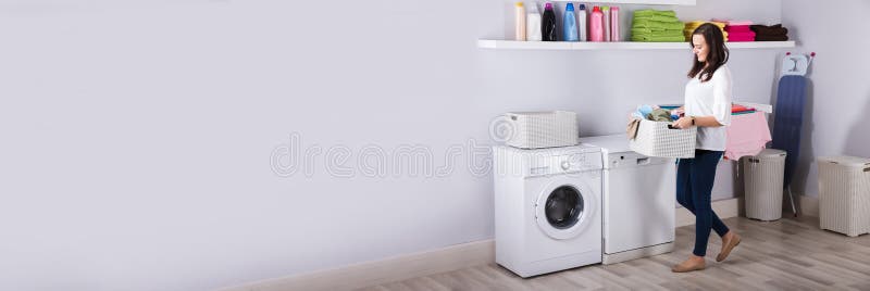 Woman Using Washing Machine Stock Photo - Image of room, washing: 255777476