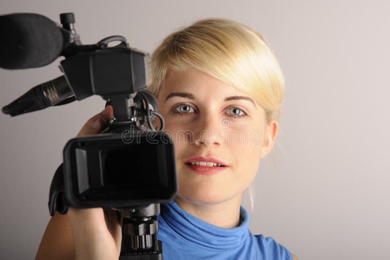 Woman with video camera stock image. Image of camara, indoor - 7149343
