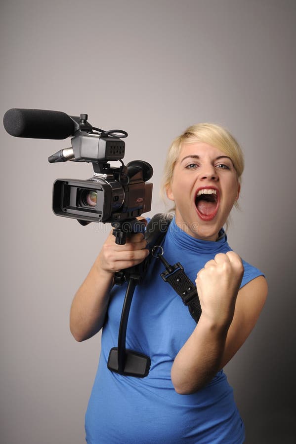 Woman with video camera stock image. Image of caucasian - 7149365