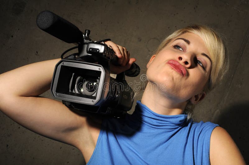 Woman with video camera stock photo. Image of madam, microphone - 7149368