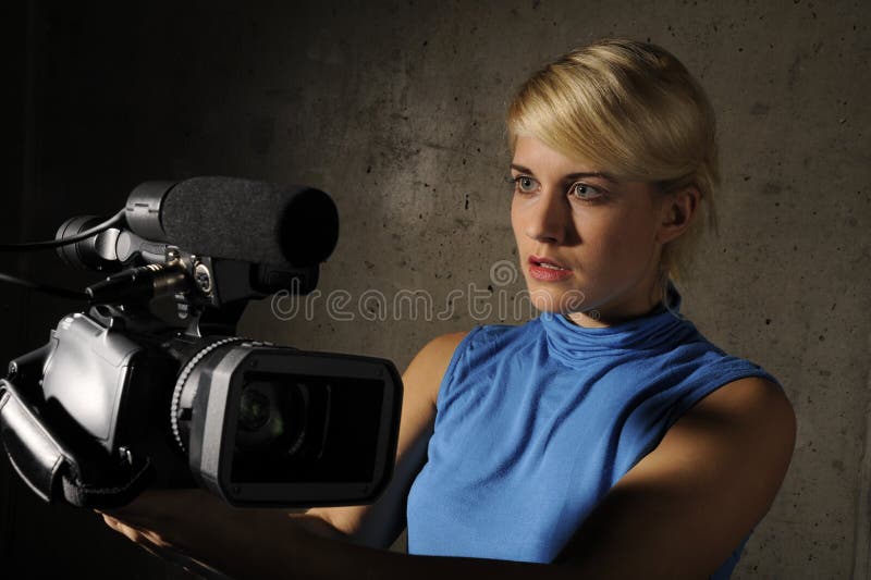 Woman with video camera stock image. Image of camera, easy - 7149385