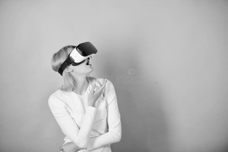 Woman with Virtual Reality Headset. Young Woman Using a Virtual Reality ...