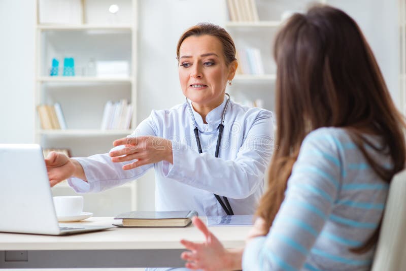 The Woman Visiting Female Doctor for Regular Check-up Stock Image ...