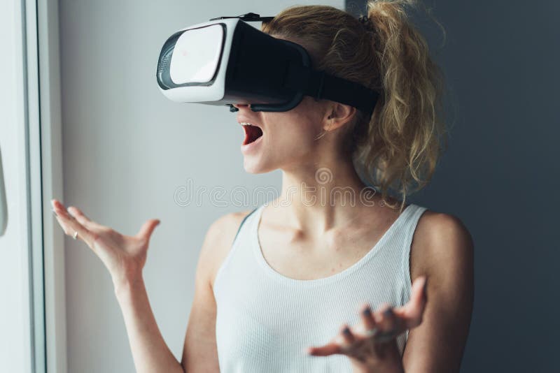 Woman in VR Headset Looking Up Stock Photo - Image of light, emotion ...